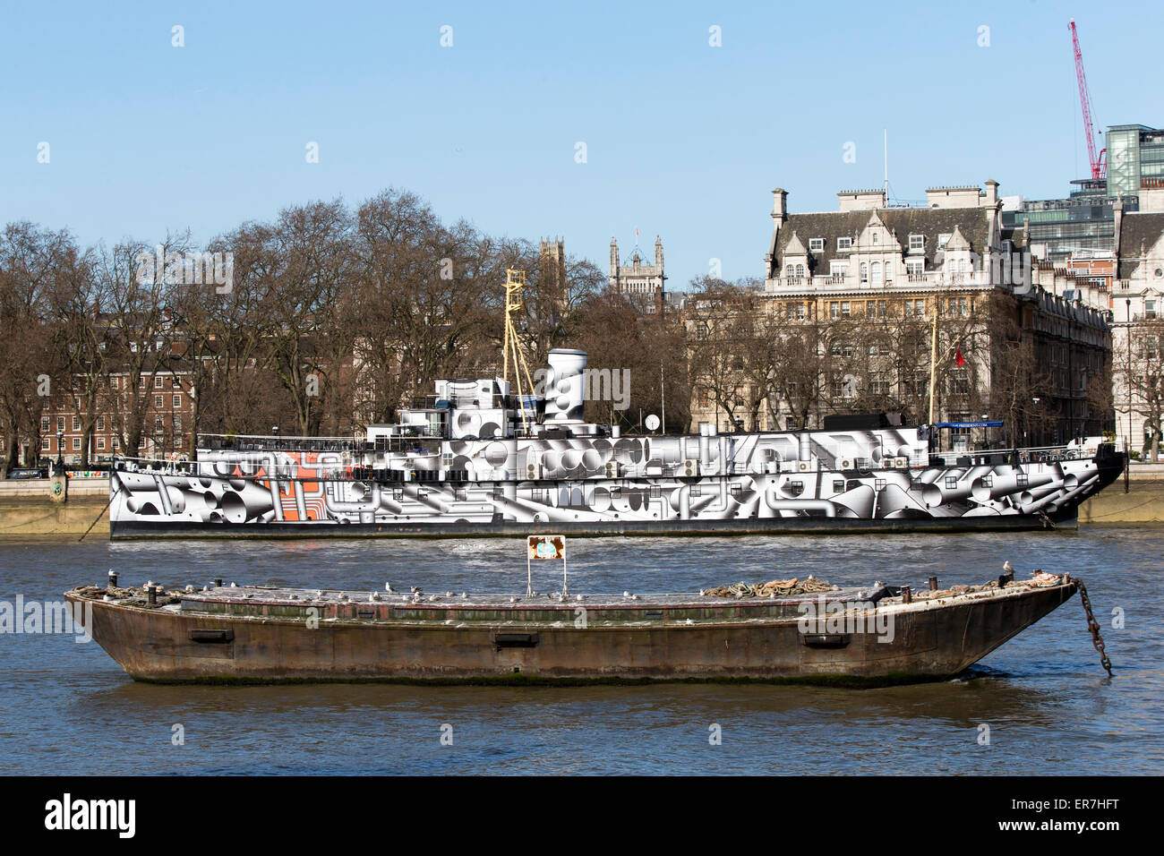 HMS President covered in WWI dazzle camouflage on the River Thames ...
