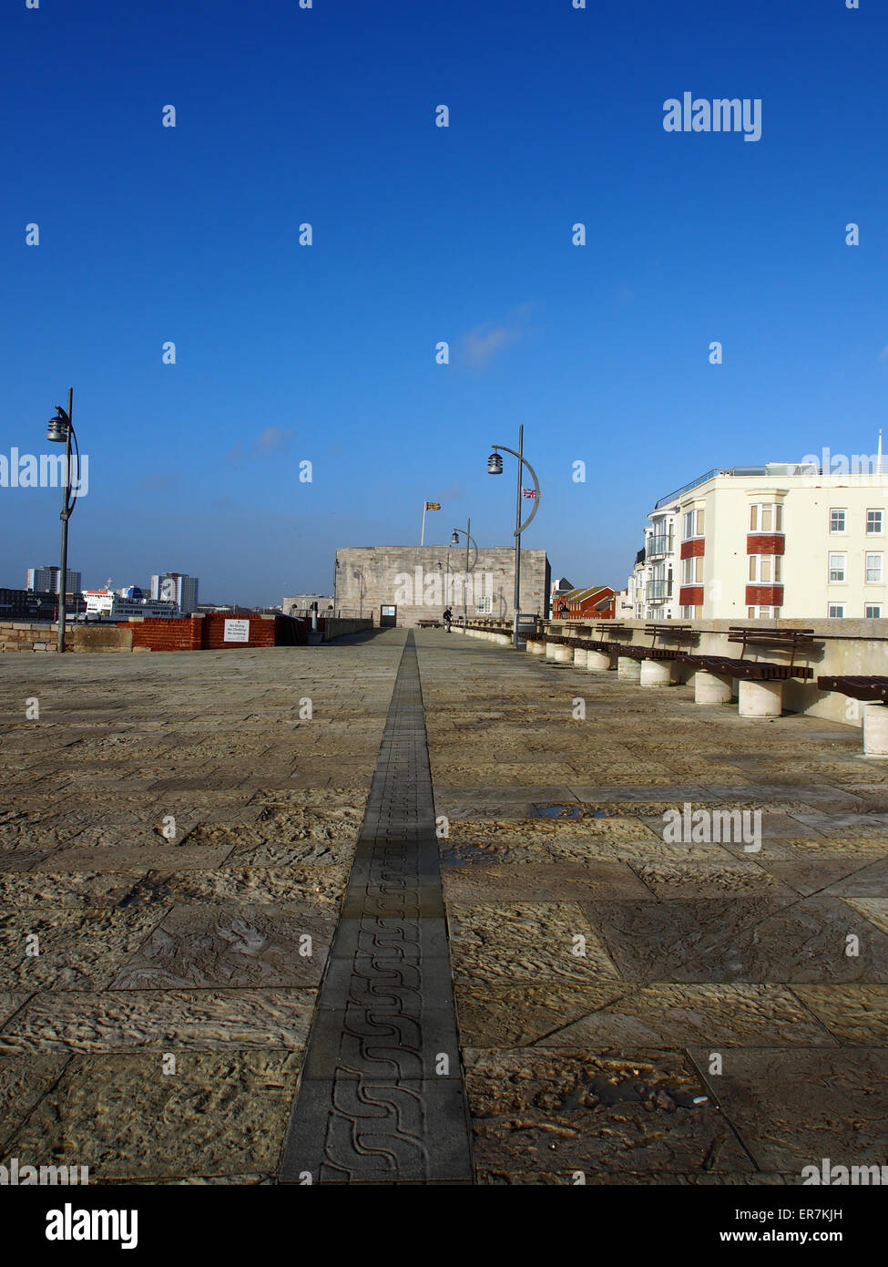 The chain link pattern on the pavement, guiding walkers along the ...