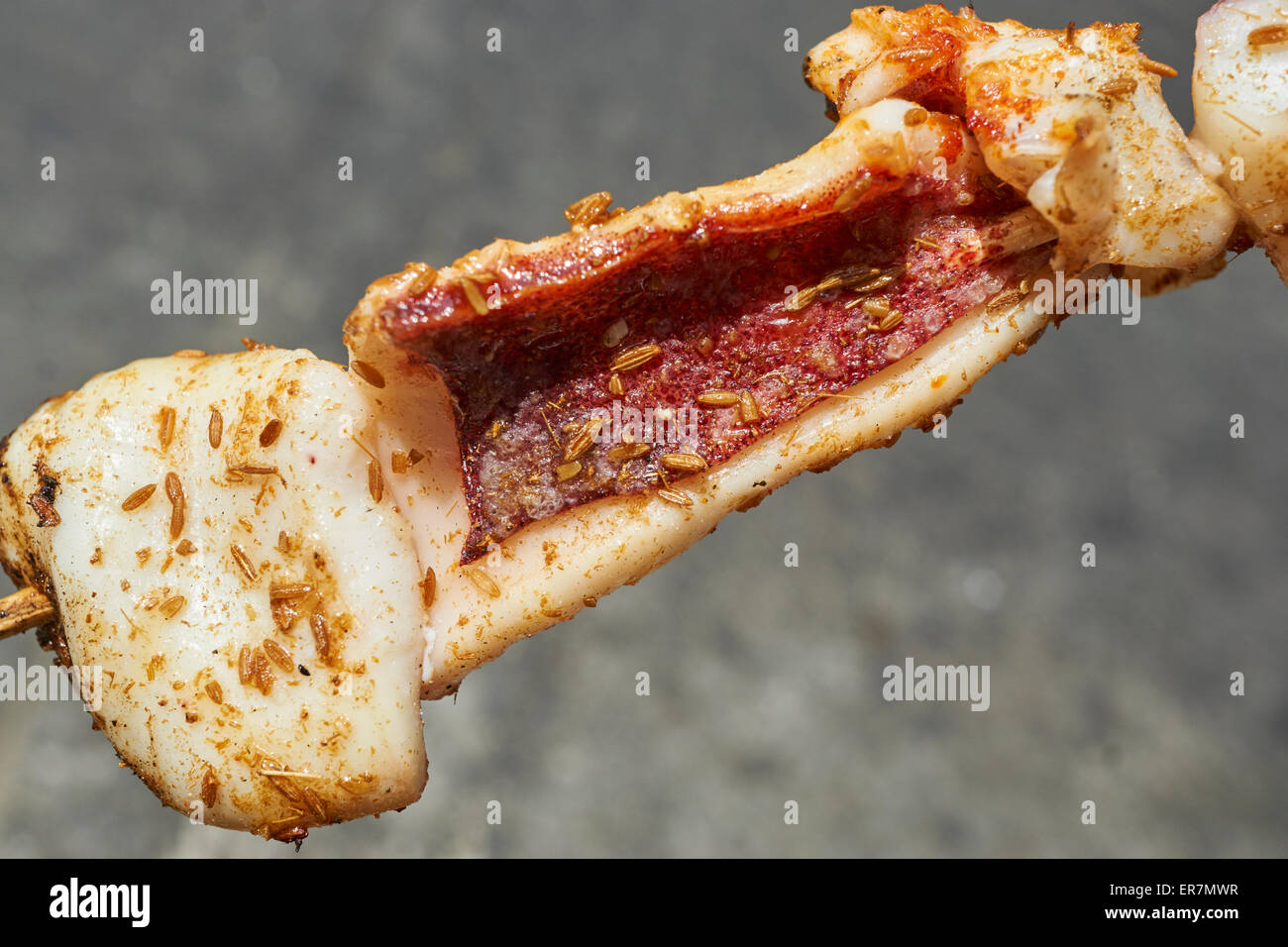 Xi'an style grilled cuttlefish sticks Stock Photo - Alamy