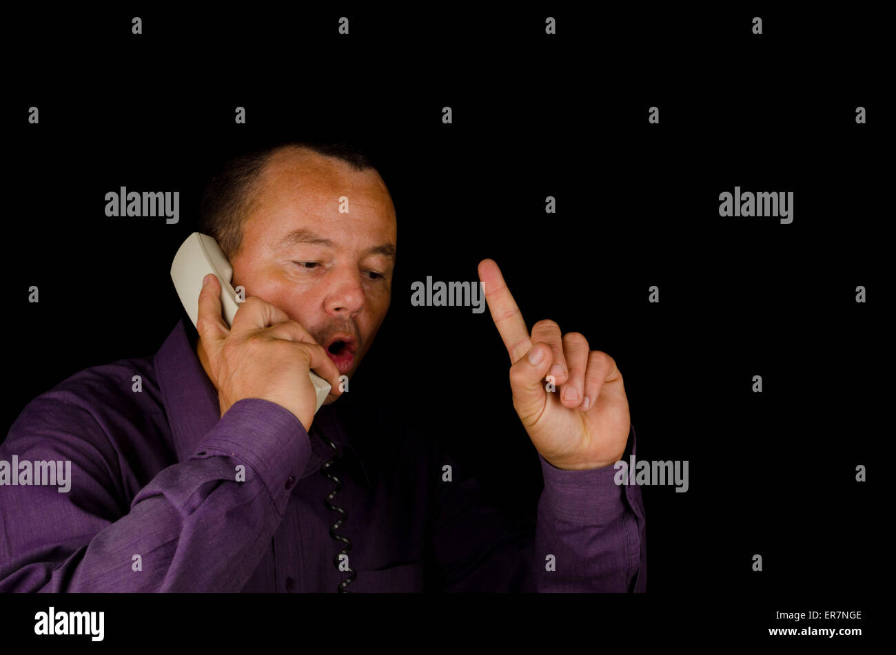 Guy becoming lound and obnoxious on the telphone Stock Photo - Alamy
