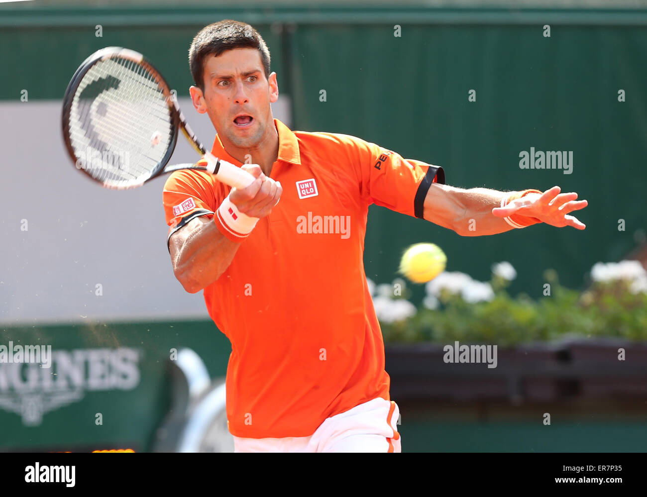 Paris, France. 28th May, 2015. Novak Djokovic of Serbia hits a return ...