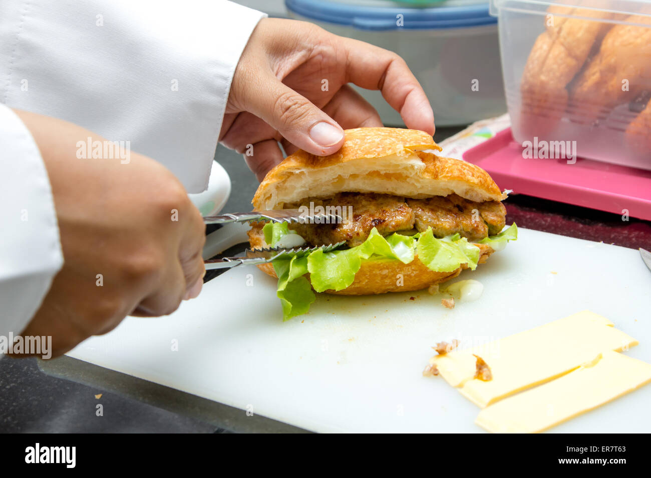 chef making croissant with gill pork, vegetable and cheese Stock Photo ...