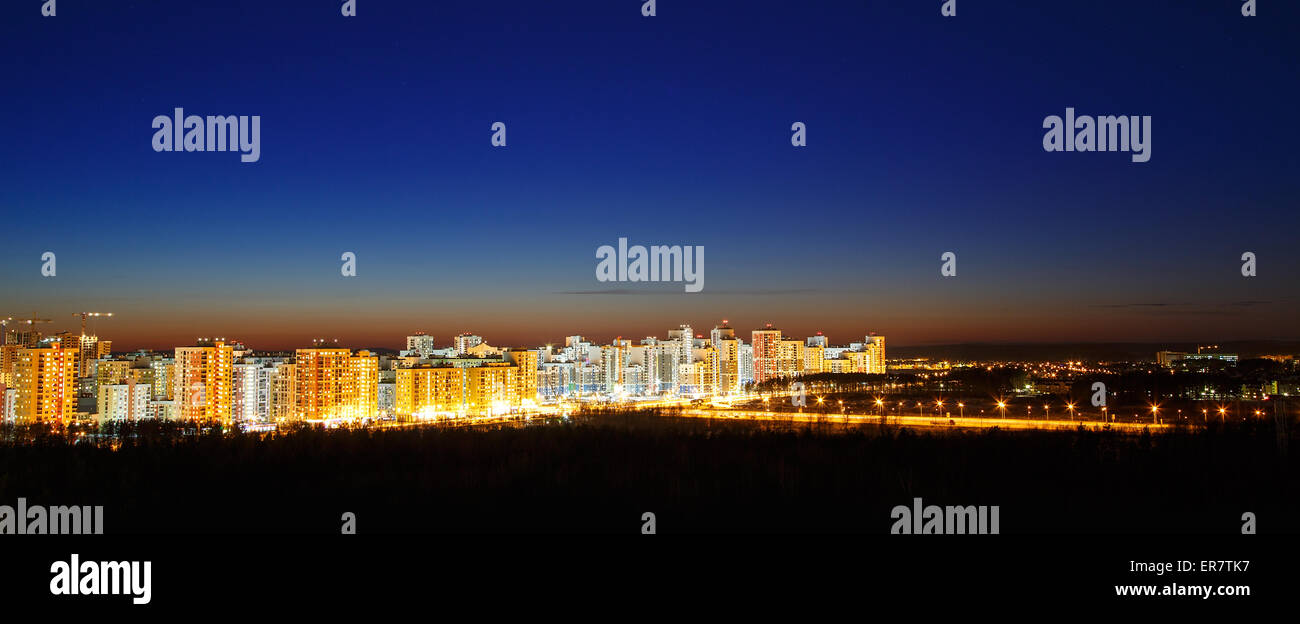 Sunset over city buildings view from above Stock Photo - Alamy