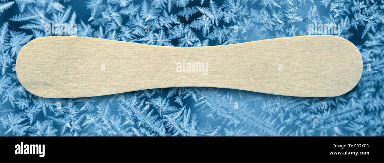 Wooden ice cream stick on frozen background Stock Photo - Alamy