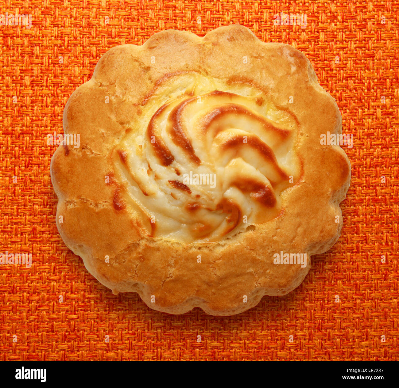 Round biscuit with filling on fabric background Stock Photo - Alamy