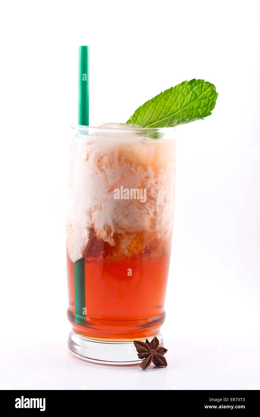 Refreshing thai iced tea garnished with fresh mint leaves Stock Photo ...