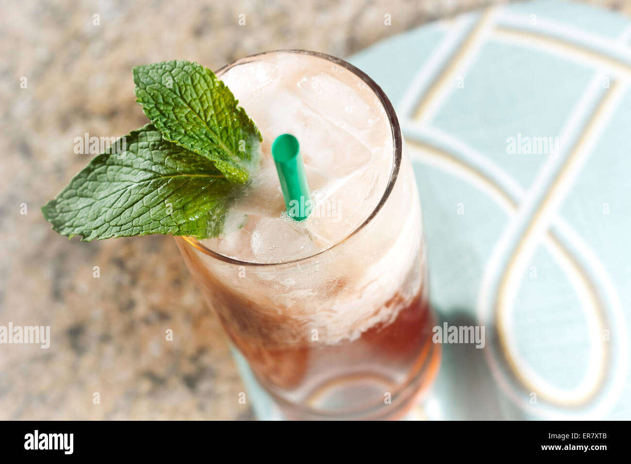 Refreshing thai iced tea garnished with fresh mint leaves Stock Photo ...