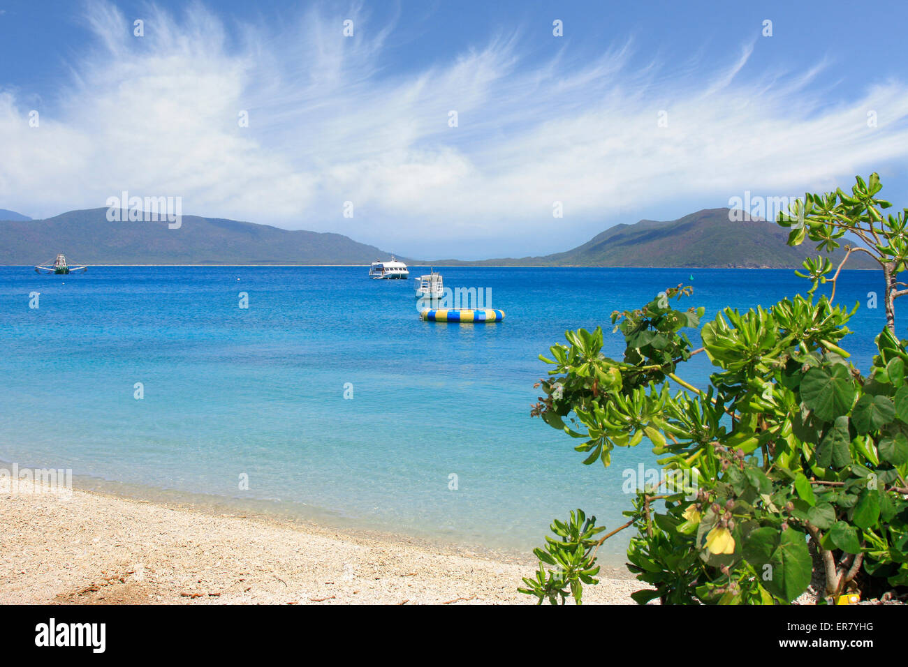 beautiful blue waters of a tropical island Stock Photo - Alamy