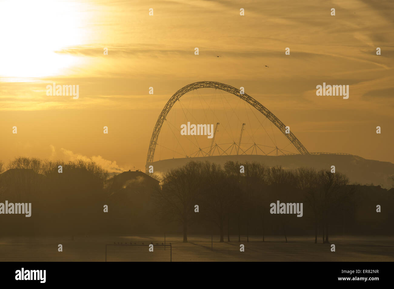 The sun rises over Wembley Stadium as weather temperatures drop across ...