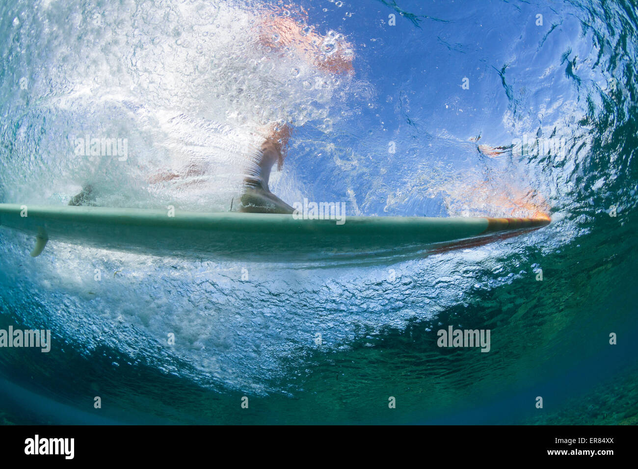 Empty Surfboard On Water