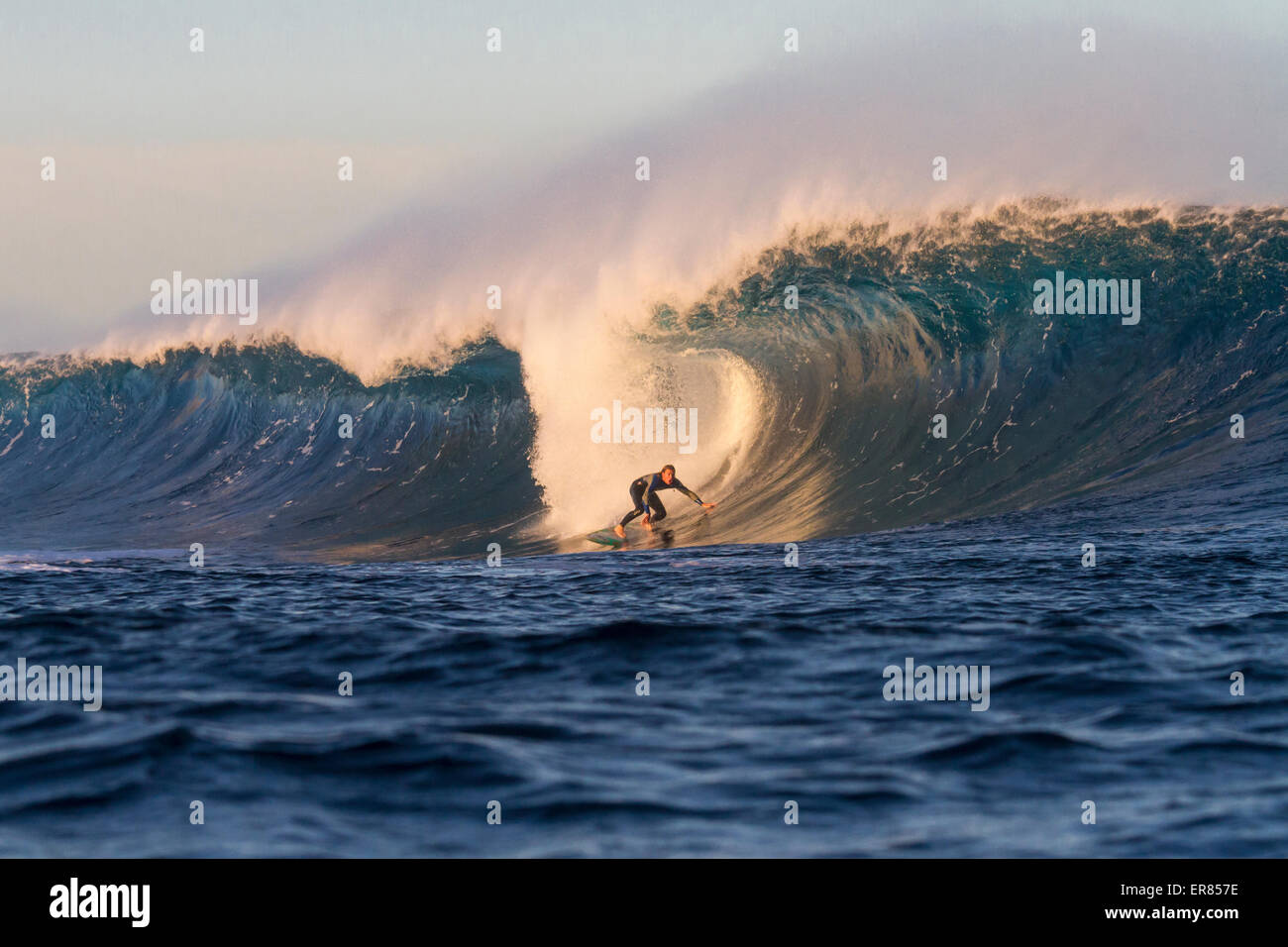 Tom Lowe, a professional big wave surfer at El Quemao wave in Lanzarote ...