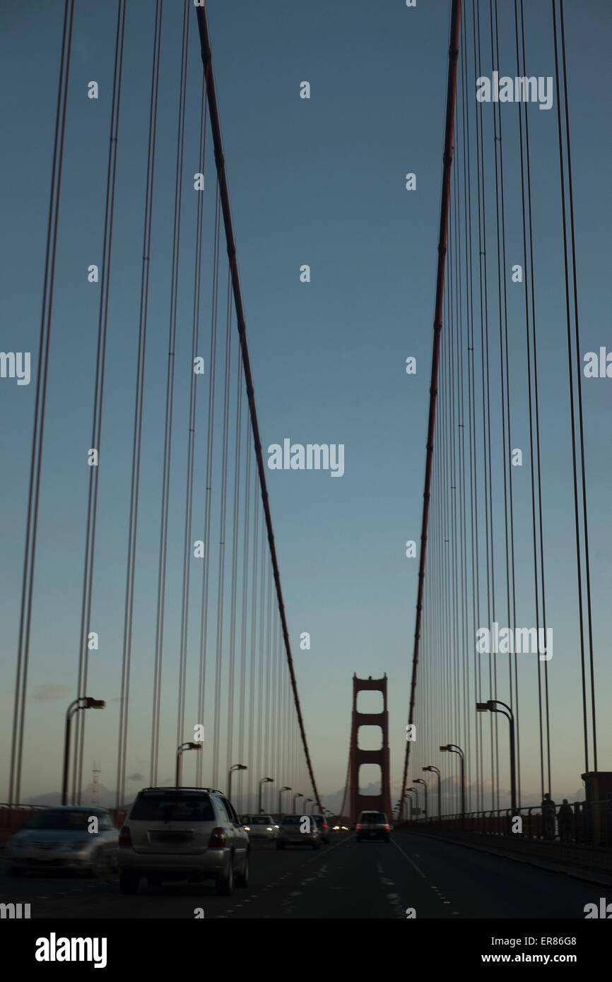 Cars on Golden Gate Bridge against clear sky during dusk Stock Photo ...