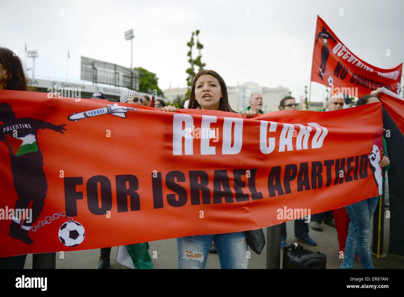 Palestinian activists hold red banners reading 'Red Card for Israel ...