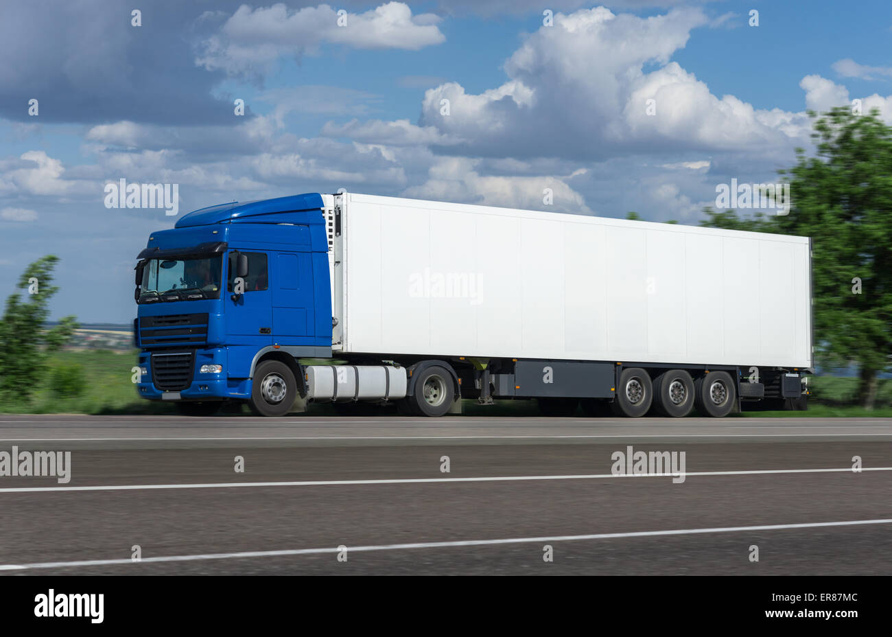cargo truck go on road Stock Photo - Alamy