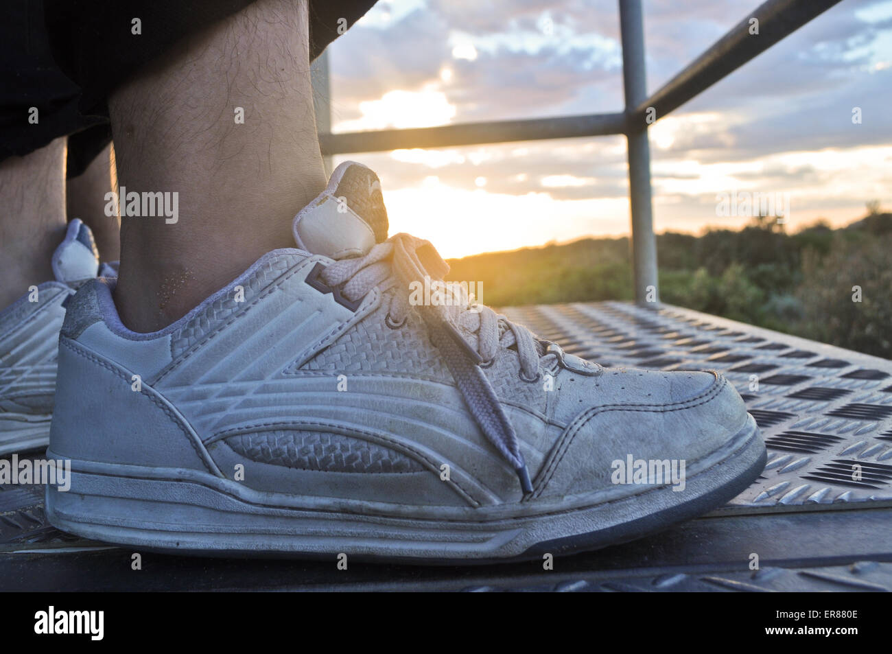 Shoes of a man jogging in the early morning Stock Photo - Alamy