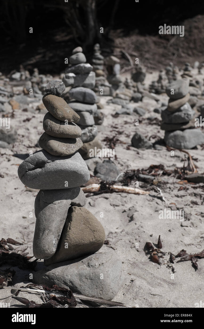 Stack of pebbles at beach Stock Photo - Alamy