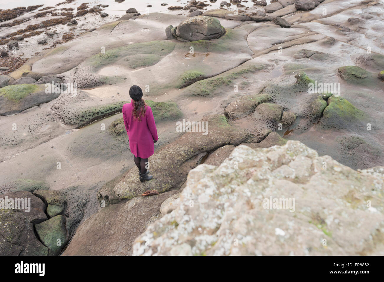 Tourist standing on rocky hi-res stock photography and images - Alamy