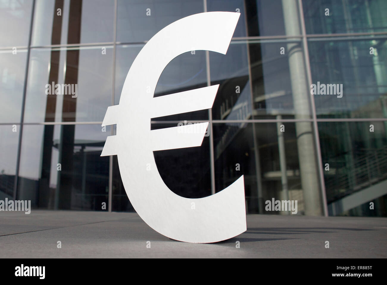 Euro symbol outside office building Stock Photo - Alamy