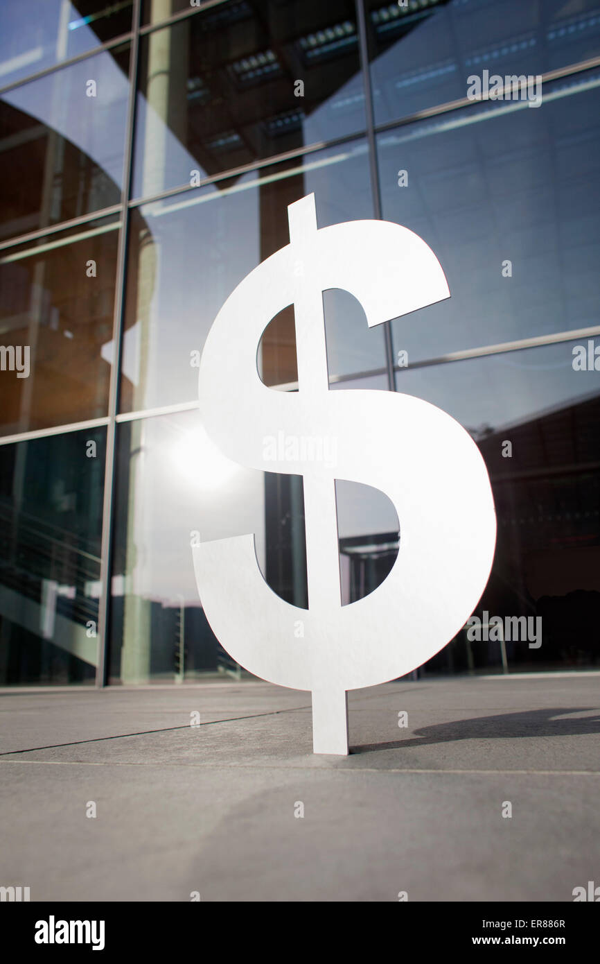 Dollar sign outside office building Stock Photo - Alamy
