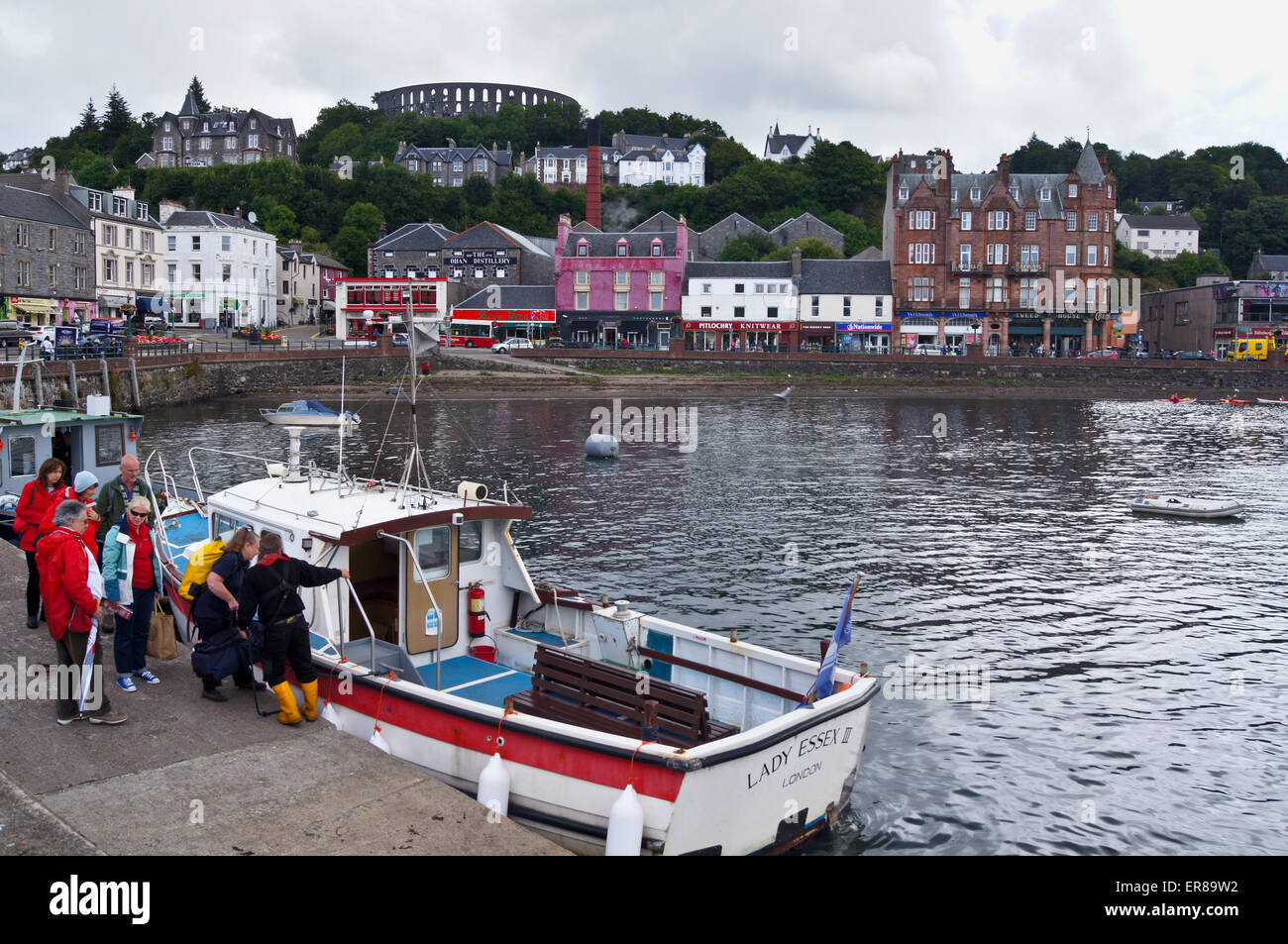 Oban harbour and waterfront, tour boat returning from island tour, Oban ...