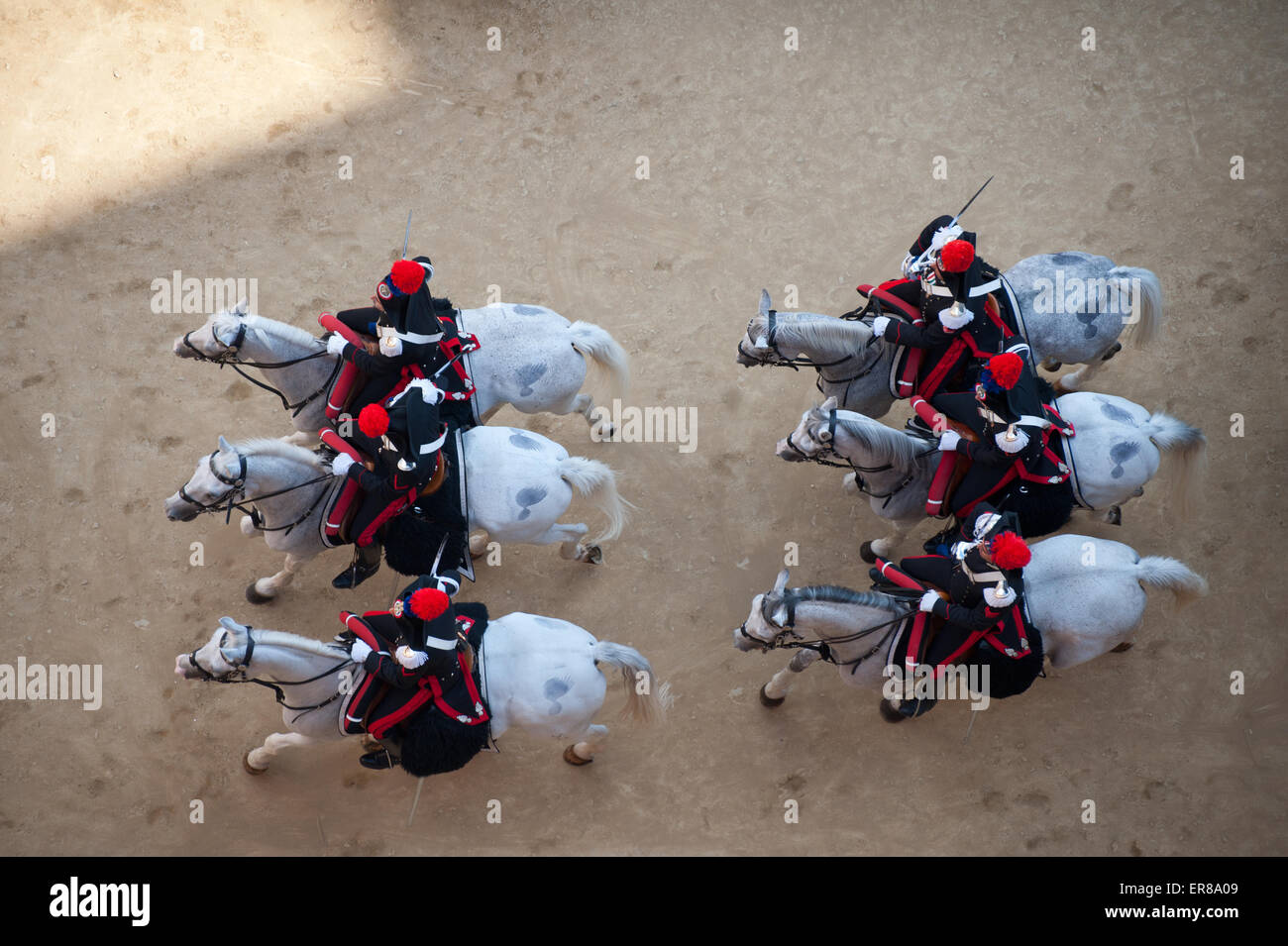 Carabinieri on horseback demonstrate a mounted charge around the ...
