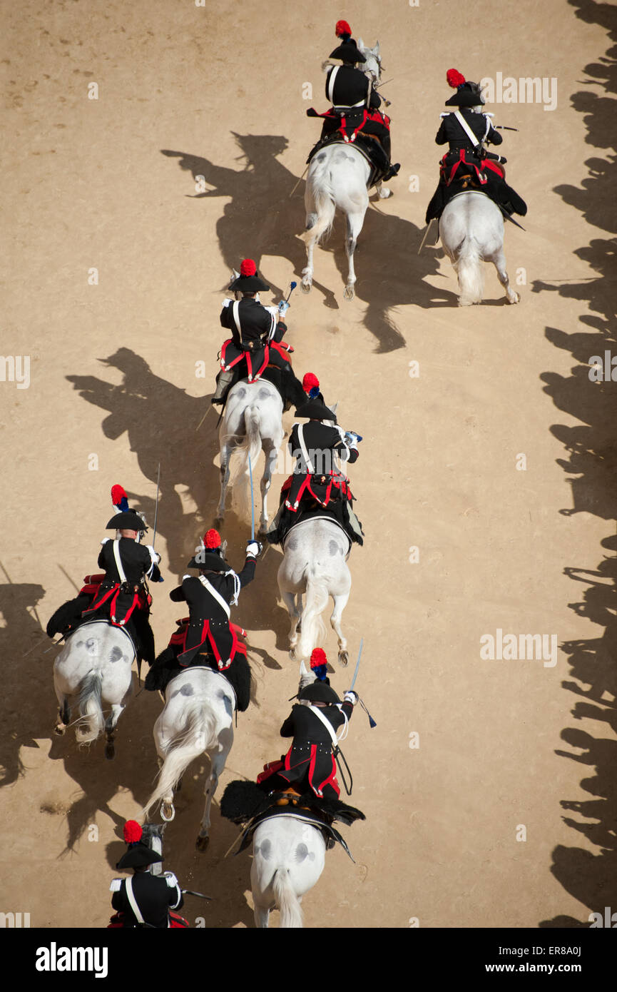 Carabinieri on horseback demonstrate a mounted charge around the ...