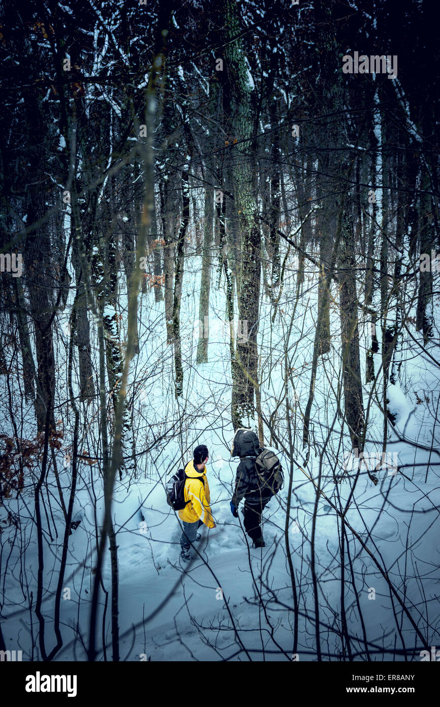 Two climbers looking down the slope Stock Photo - Alamy