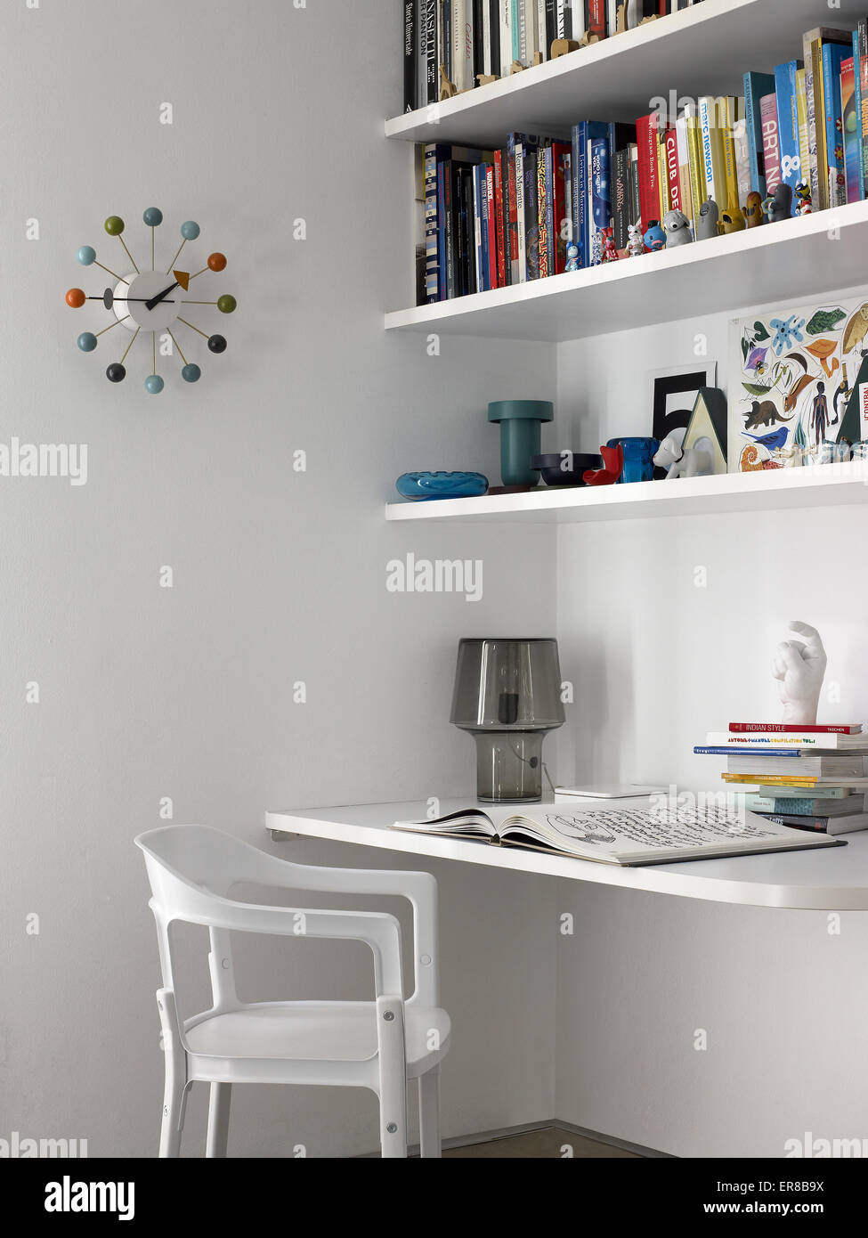 Interior of a contemporary home, a desk corner in a studio with a wall ...