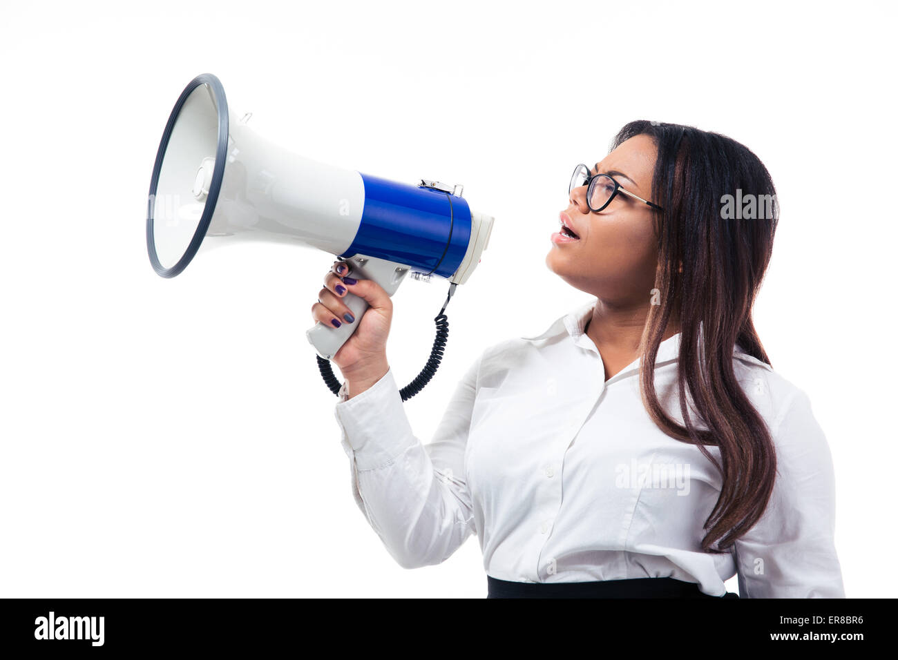 African businesswoman shouting in megaphone isolated on a white ...