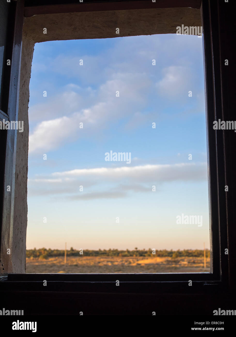 Cloudy sky through window, Erfoud, Morocco Stock Photo - Alamy