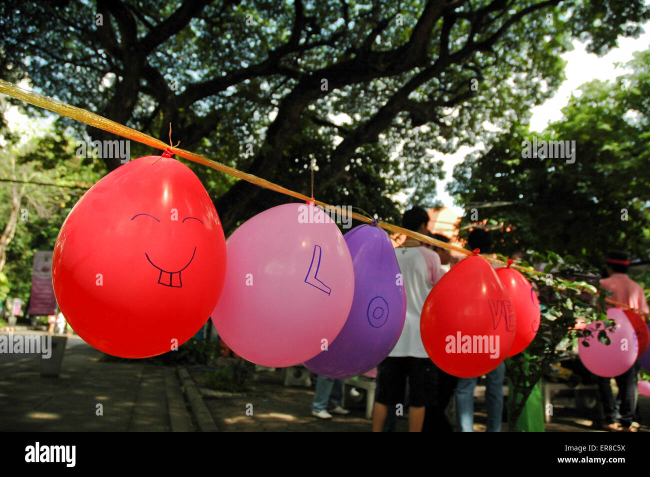 colorful balloons on a line Stock Photo - Alamy