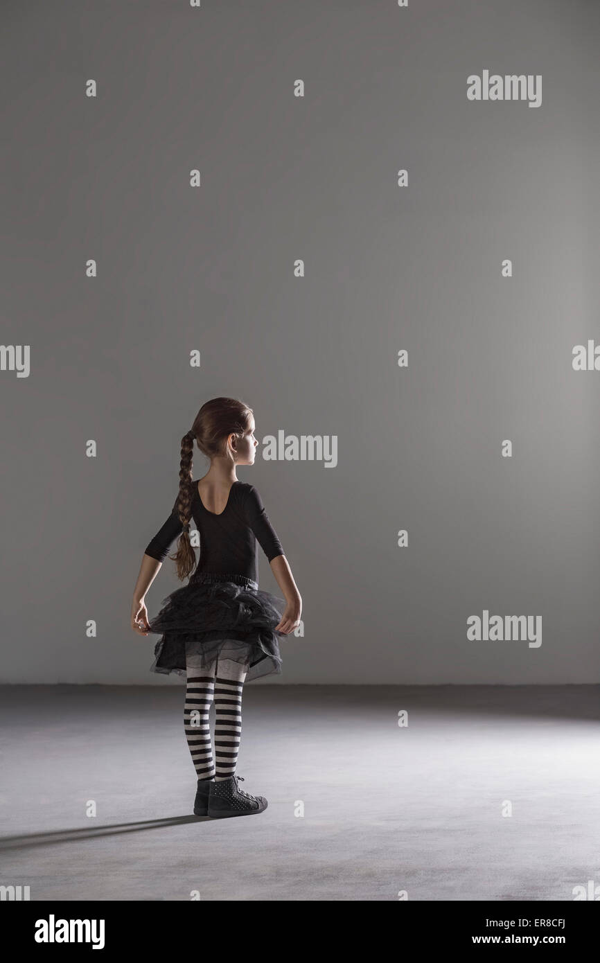 Full length rear view of girl in ballet costume in studio Stock Photo ...