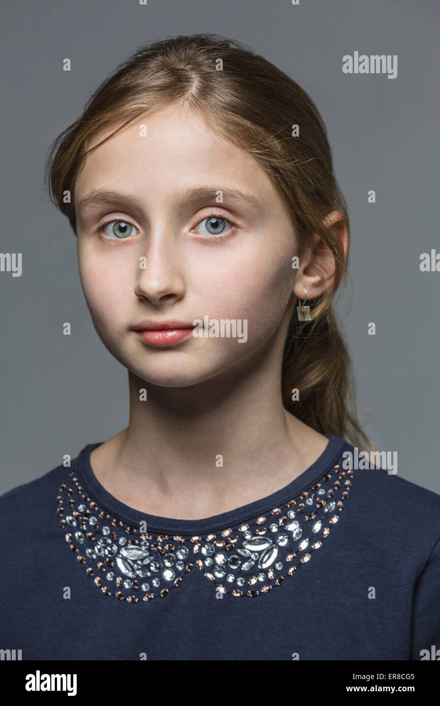 Portrait of girl over gray background Stock Photo - Alamy