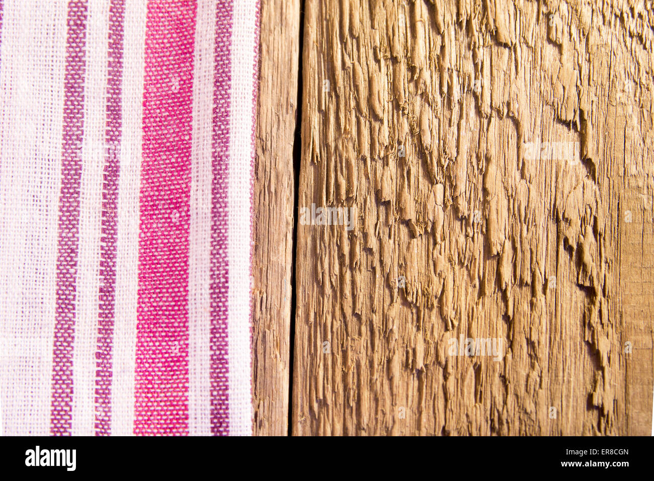 striped napkin on rustic wooden background (table, texture Stock Photo ...