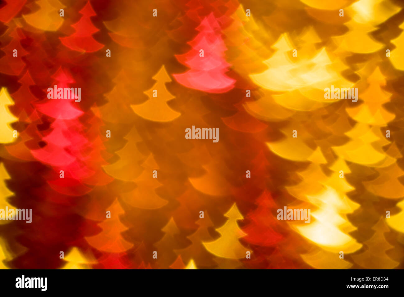 photo of red and golden fir trees boke as background Stock Photo - Alamy