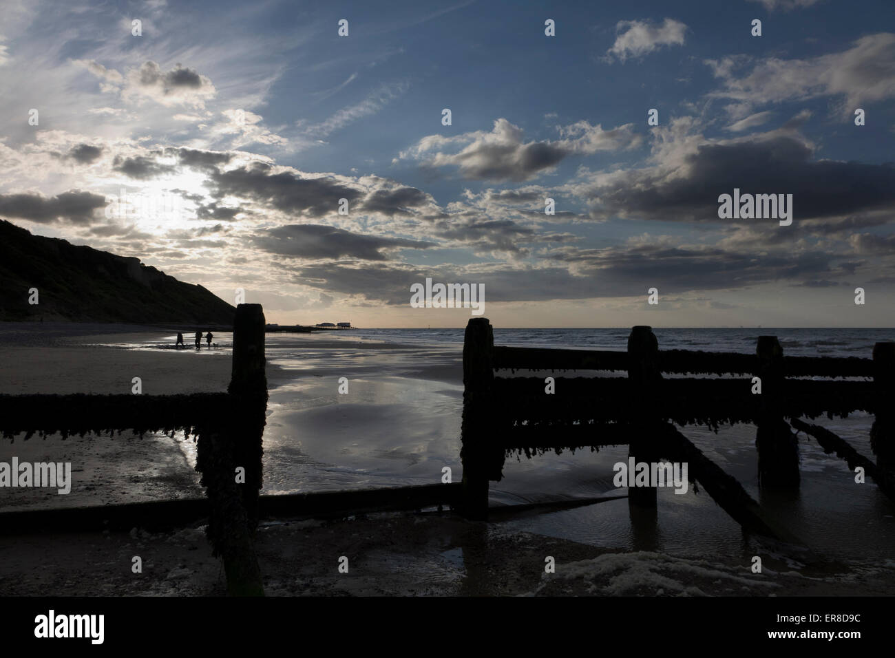 Walk on beach sunset walkers Stock Photo - Alamy