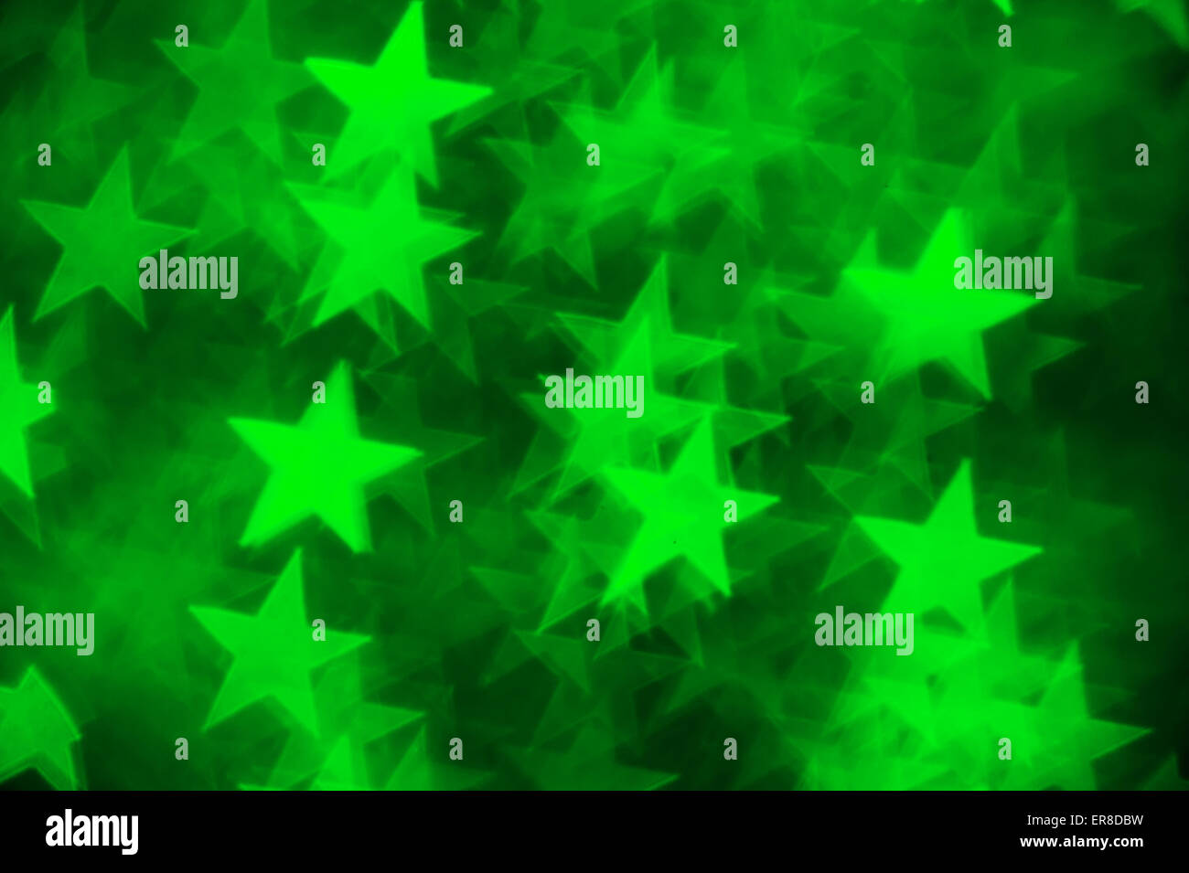 green star shape as background Stock Photo - Alamy