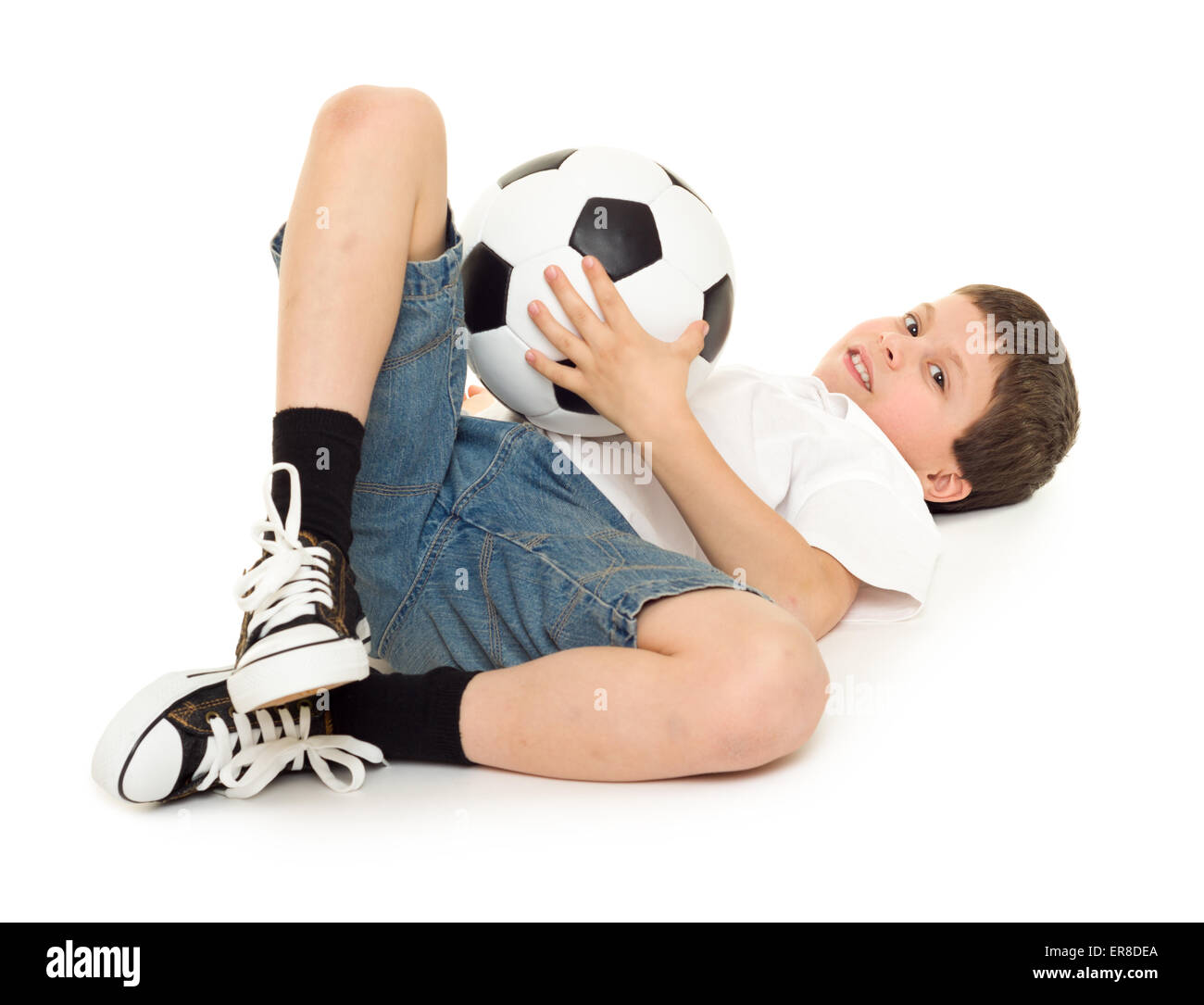 soccer boy studio isolated on white Stock Photo - Alamy