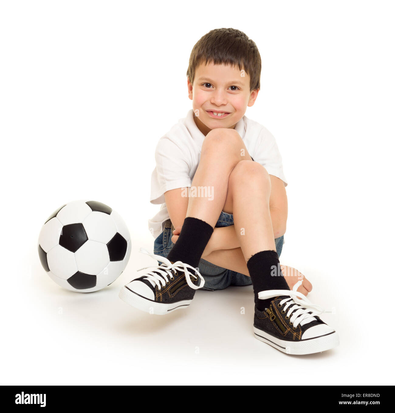 boy with soccer ball studio isolated Stock Photo - Alamy
