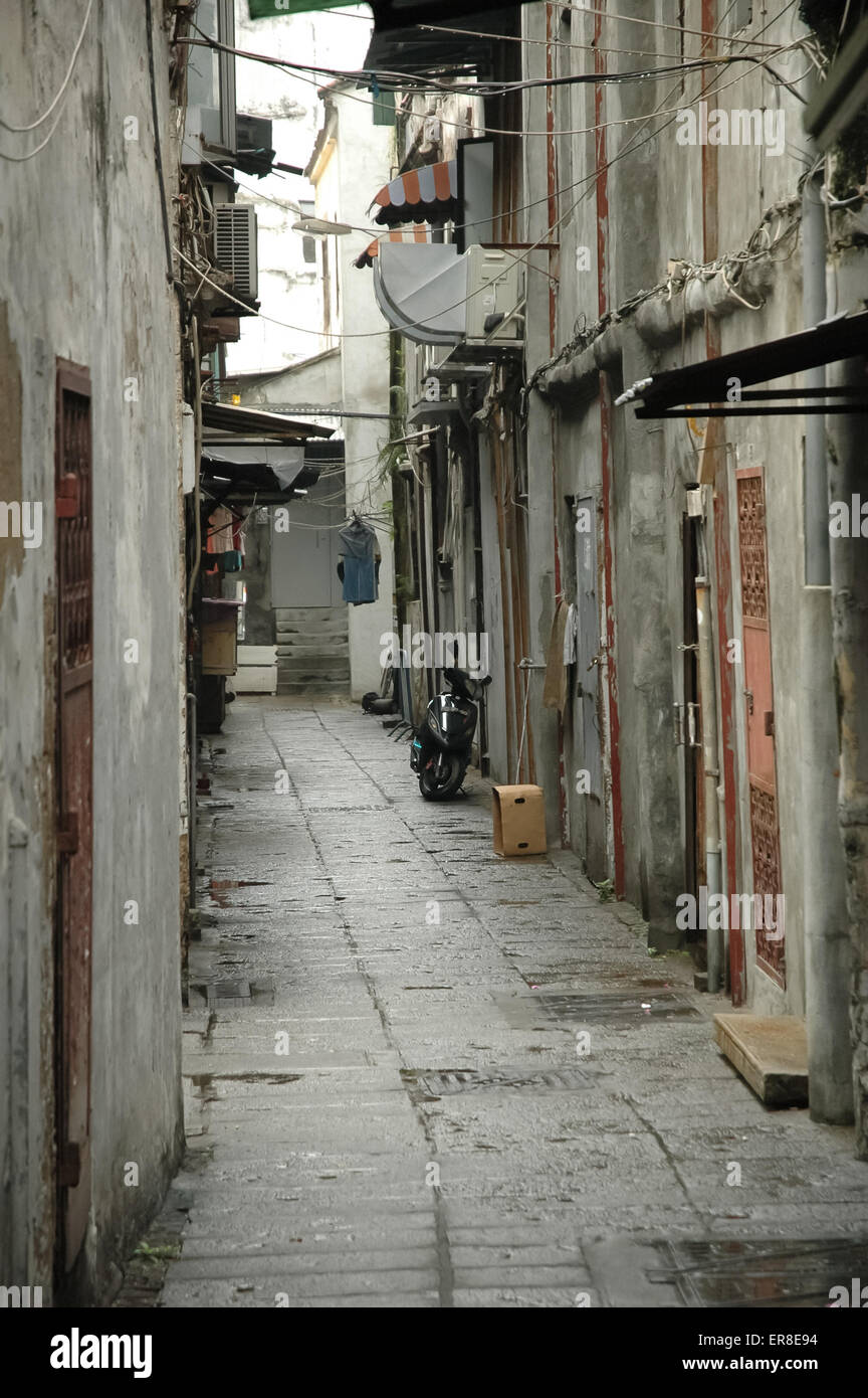 Old lane vintage pavement alley in Macau Stock Photo - Alamy