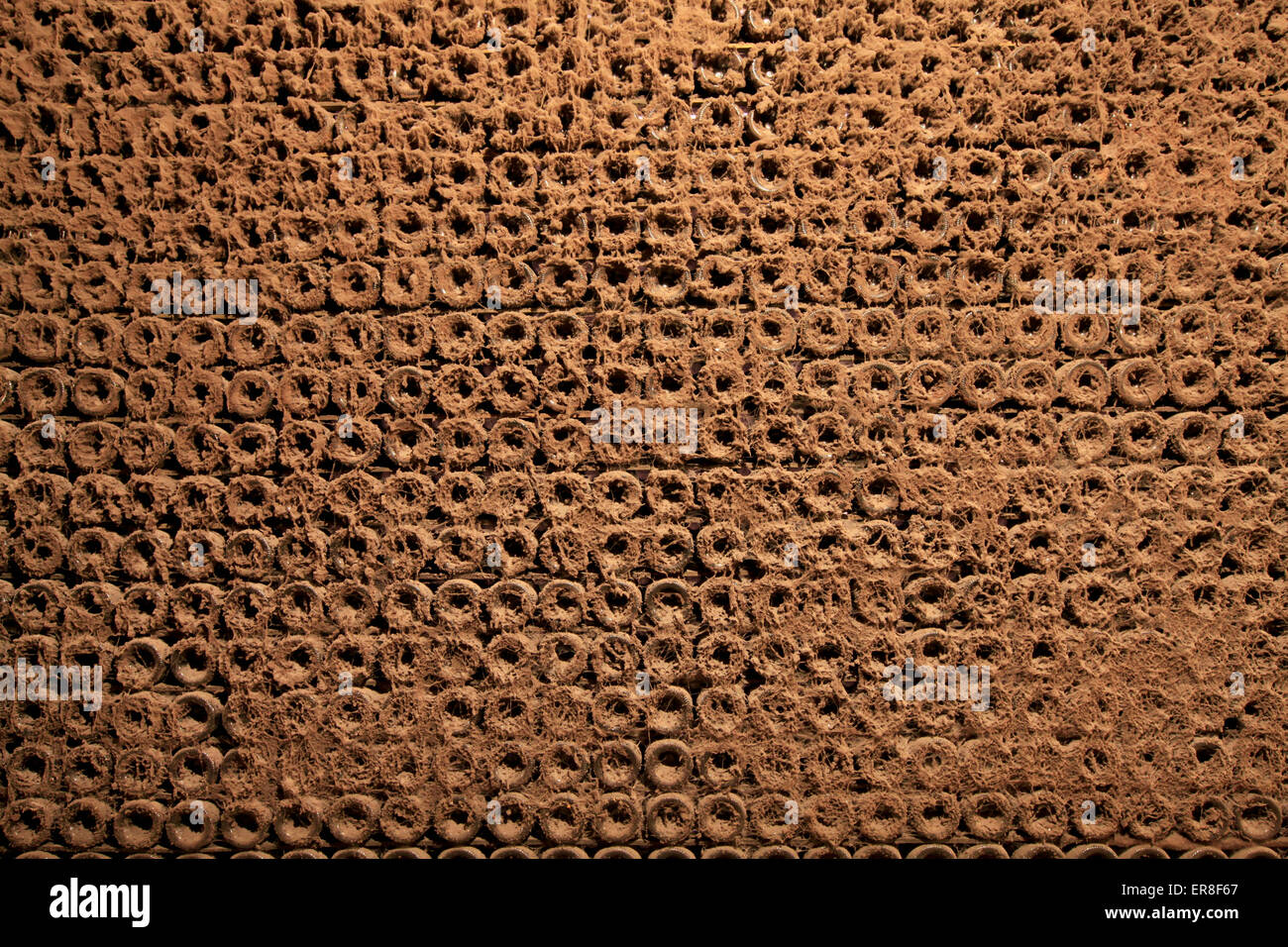 Full frame shot of muddy pipes Stock Photo - Alamy