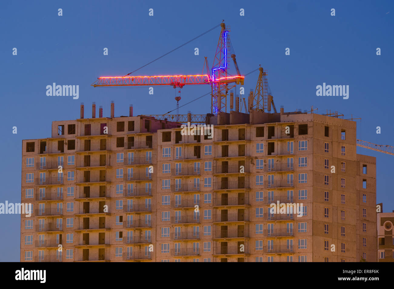 Construction of multi-storey building with a crane Stock Photo - Alamy