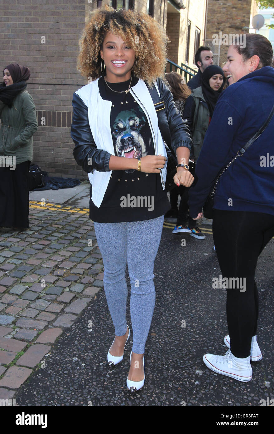 X Factor finalists arrive at a recording studio for rehearsals ...