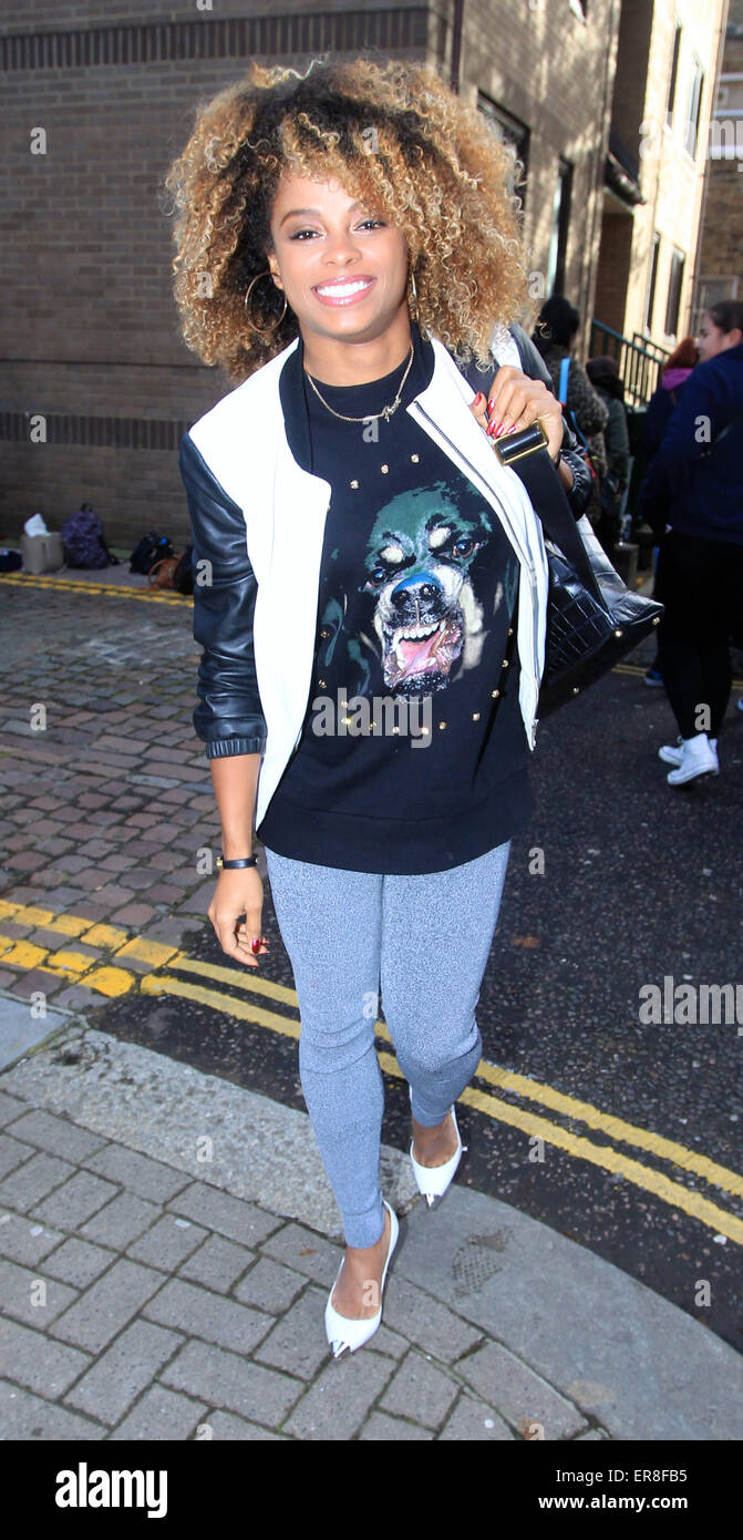 X Factor finalists arrive at a recording studio for rehearsals ...