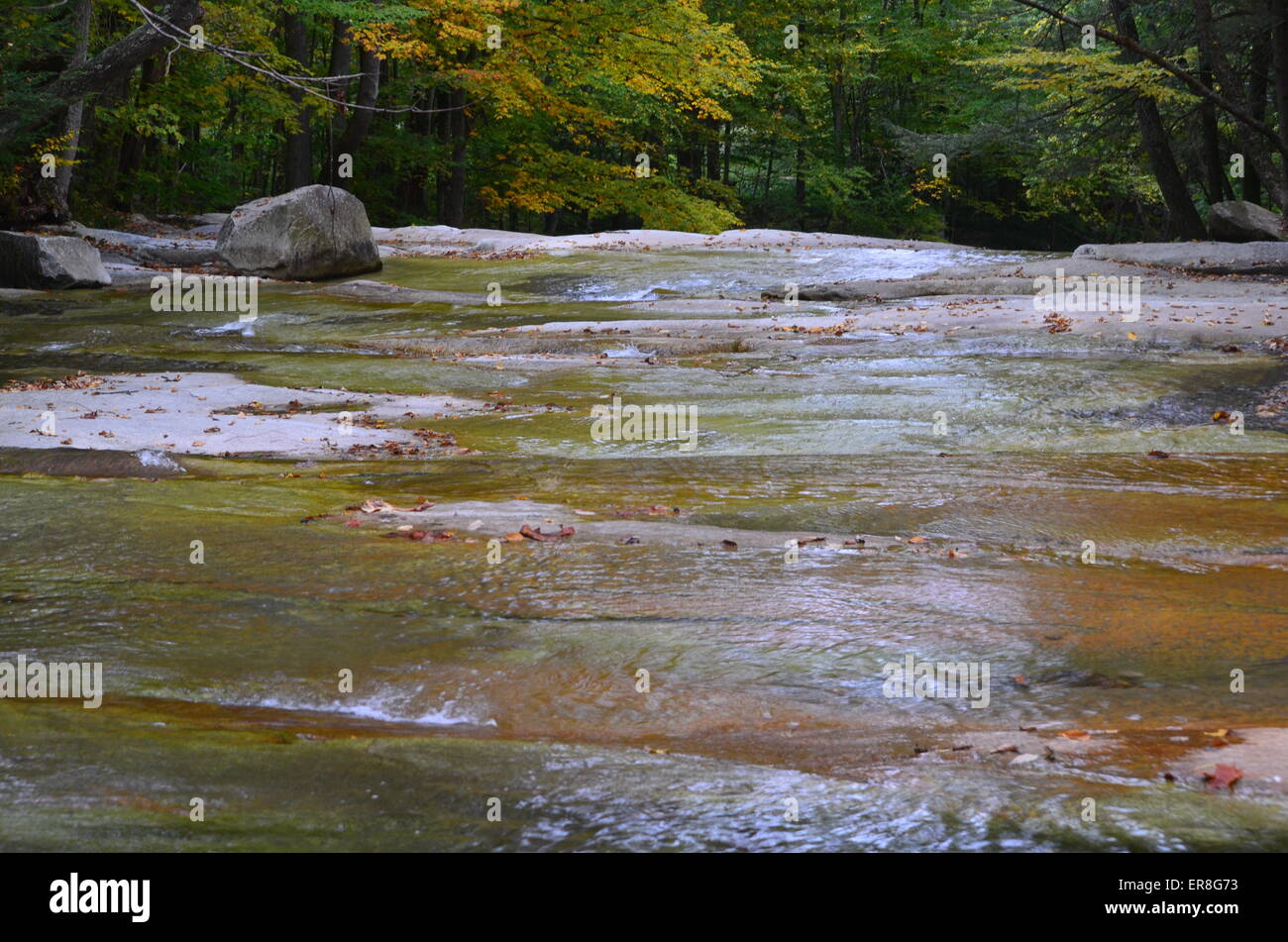 River flowing over rocks Stock Photo - Alamy