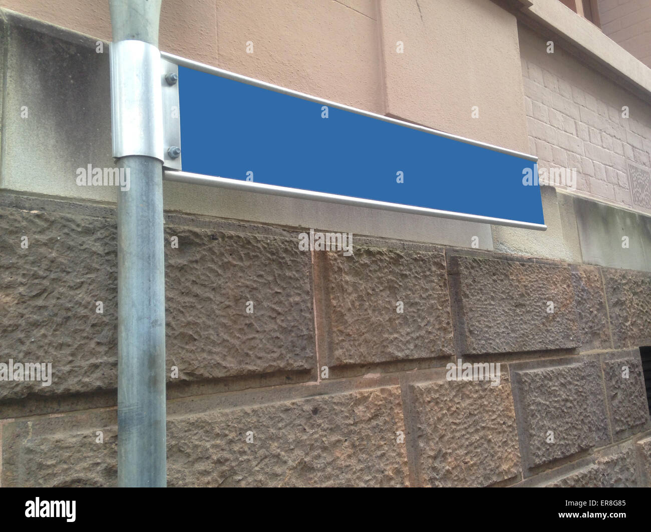 Blank direction blue sign on a metal pole Stock Photo - Alamy