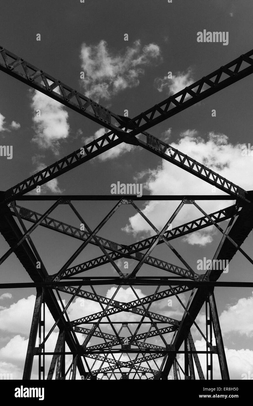 Silhouette bridge against cloudy sky Stock Photo - Alamy