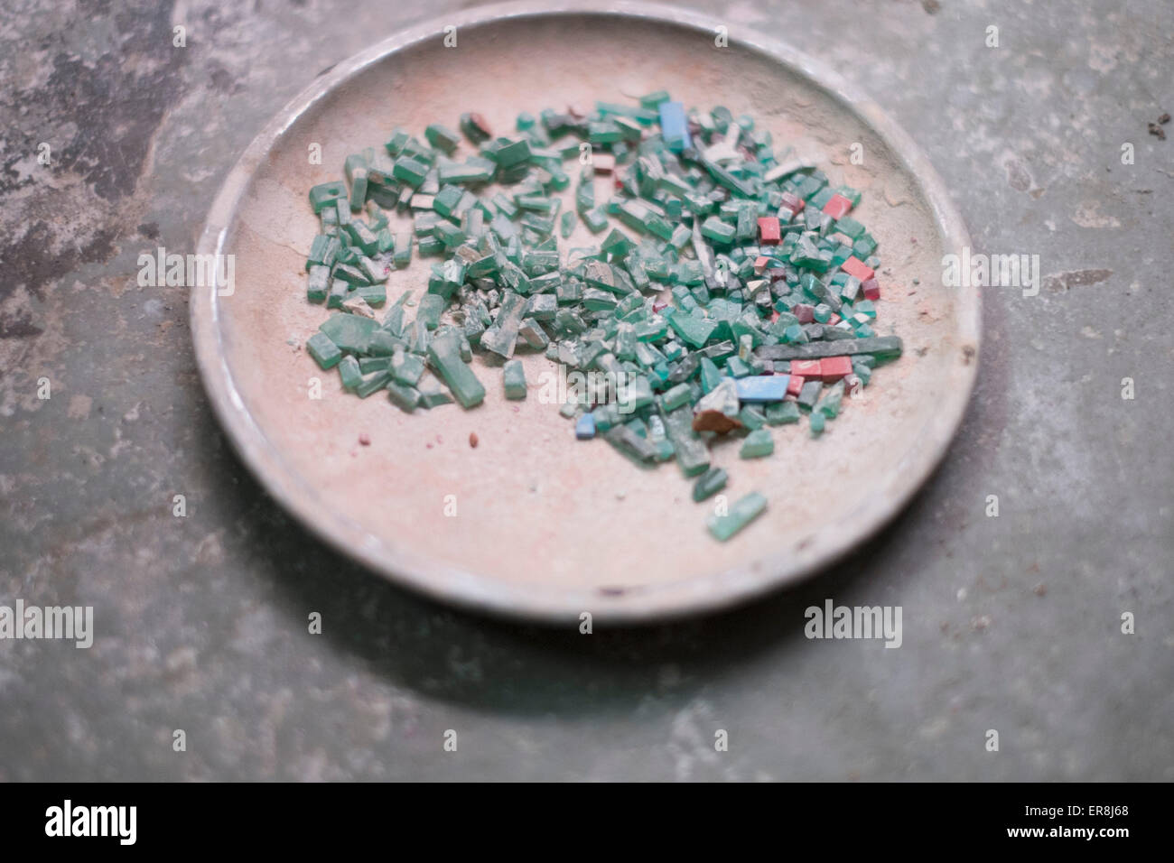 Pieces of mineral stone in plate Stock Photo - Alamy