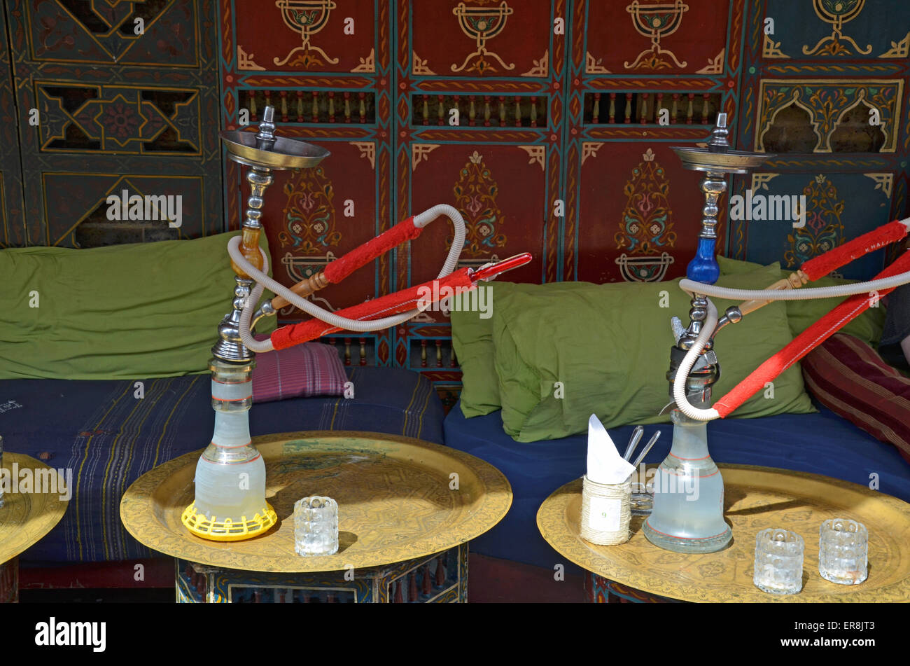 hookah pipes at outside tables at a cafe Stock Photo - Alamy