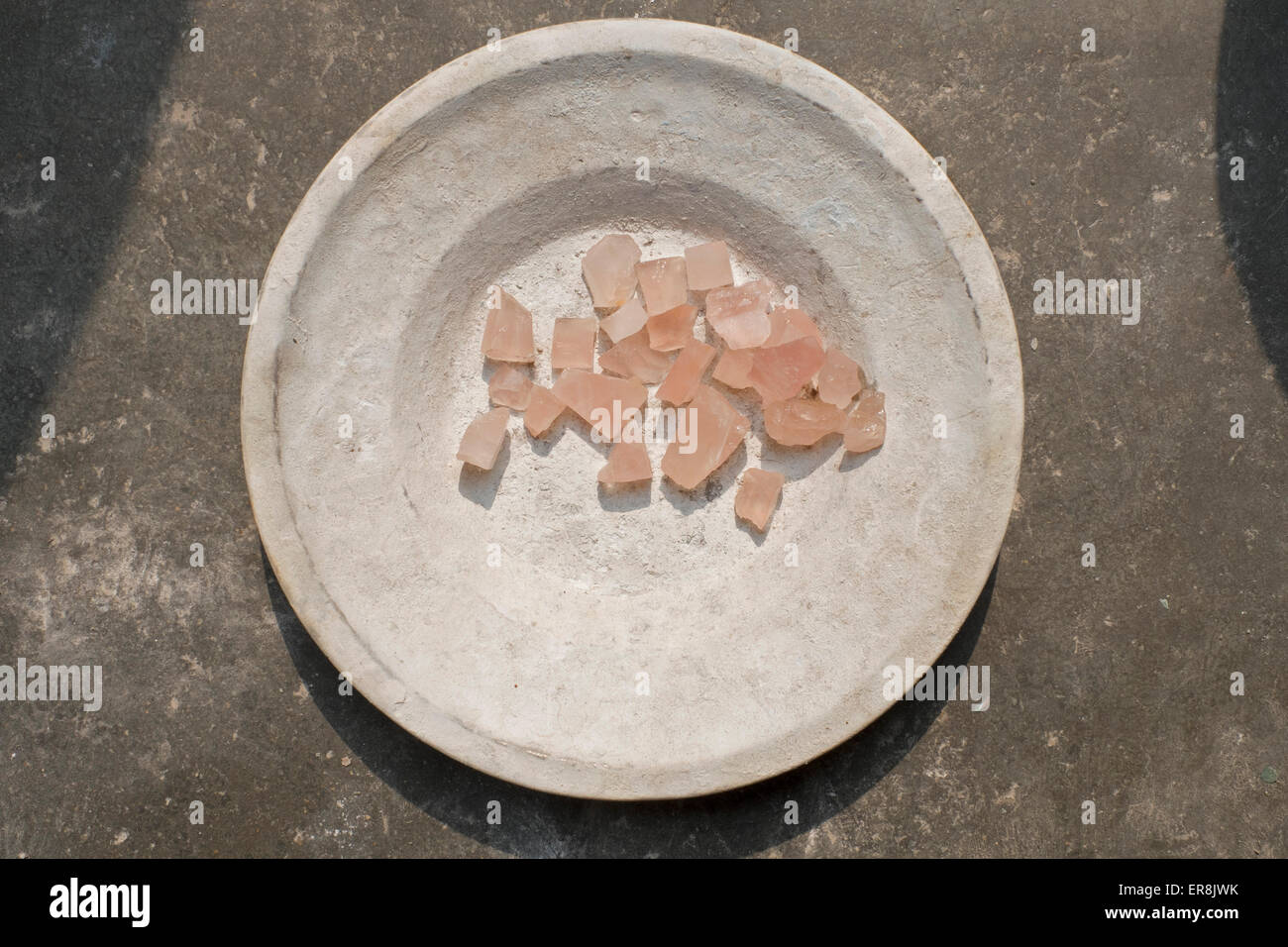 High angle view of mineral stones in messy plate on surface Stock Photo ...